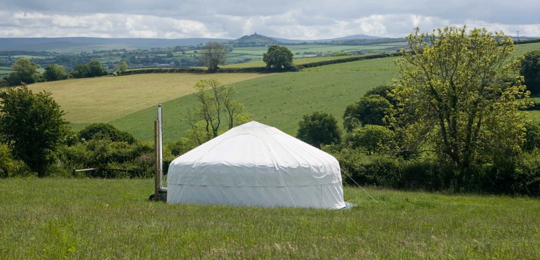 View across the paddock to Brentor Church - Devon Yurt